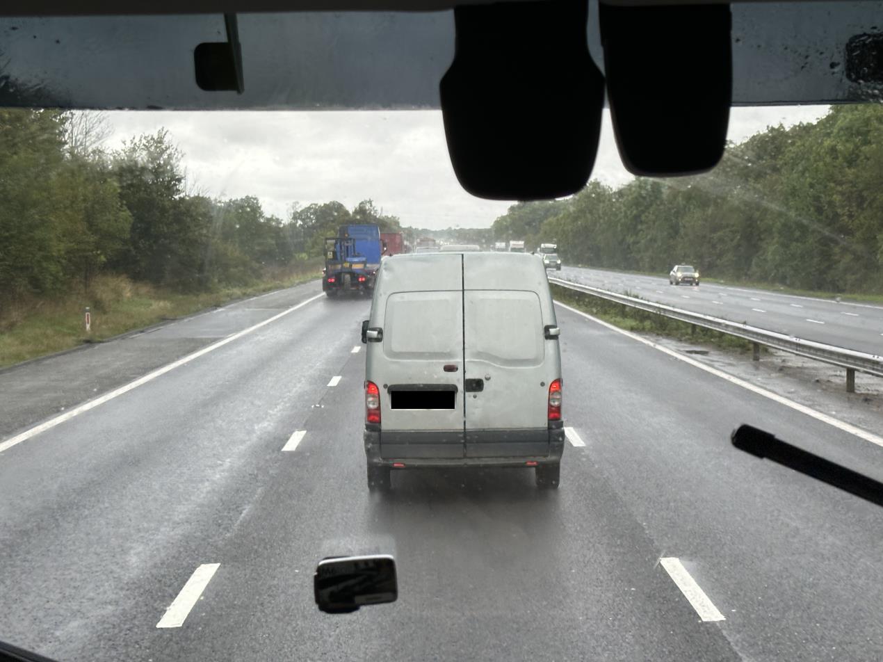 Motorists on their phones and eating food behind the wheel amongst ...